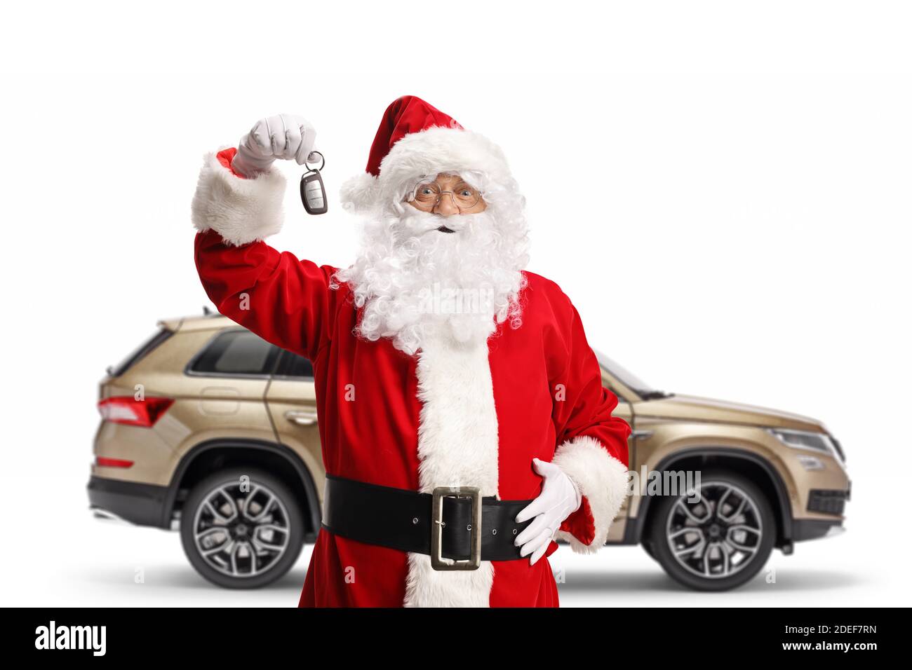 Happy santa Claus with a SUV showing car keys isolated on white ...