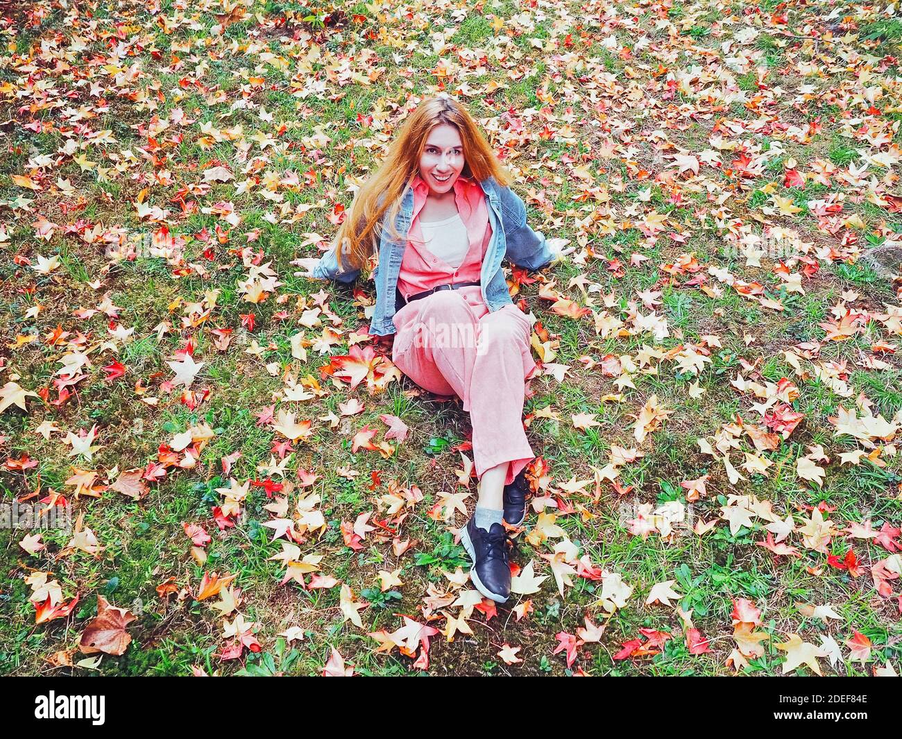 Red haired girl maple hi-res stock photography and images - Alamy