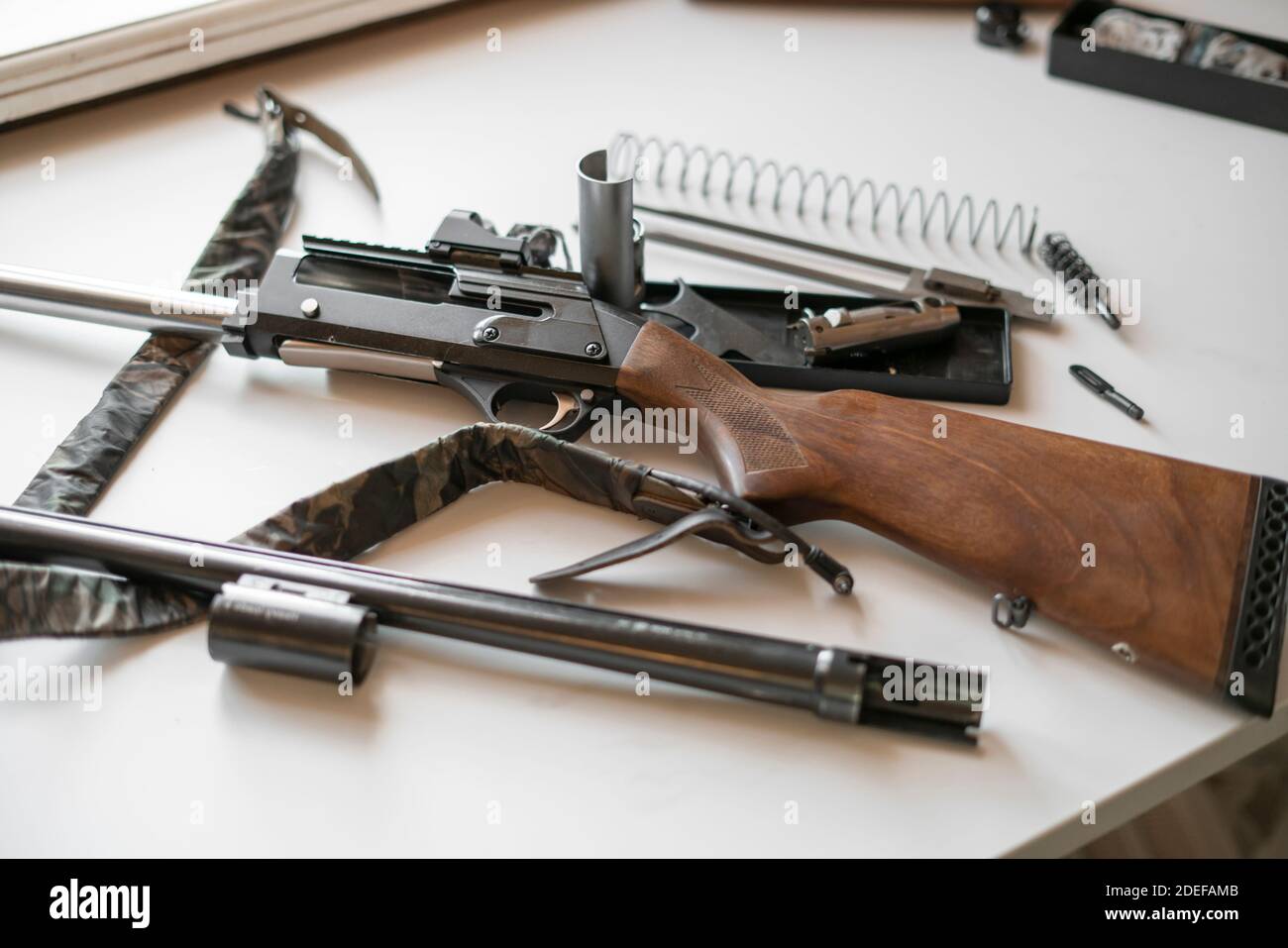 classic wooden and metal hunting weapon rifle disassembled parts and ...