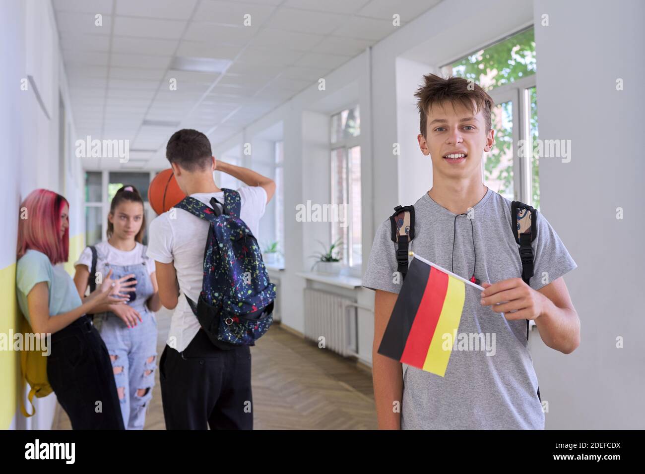 Boy student holding national flag hi-res stock photography and images ...