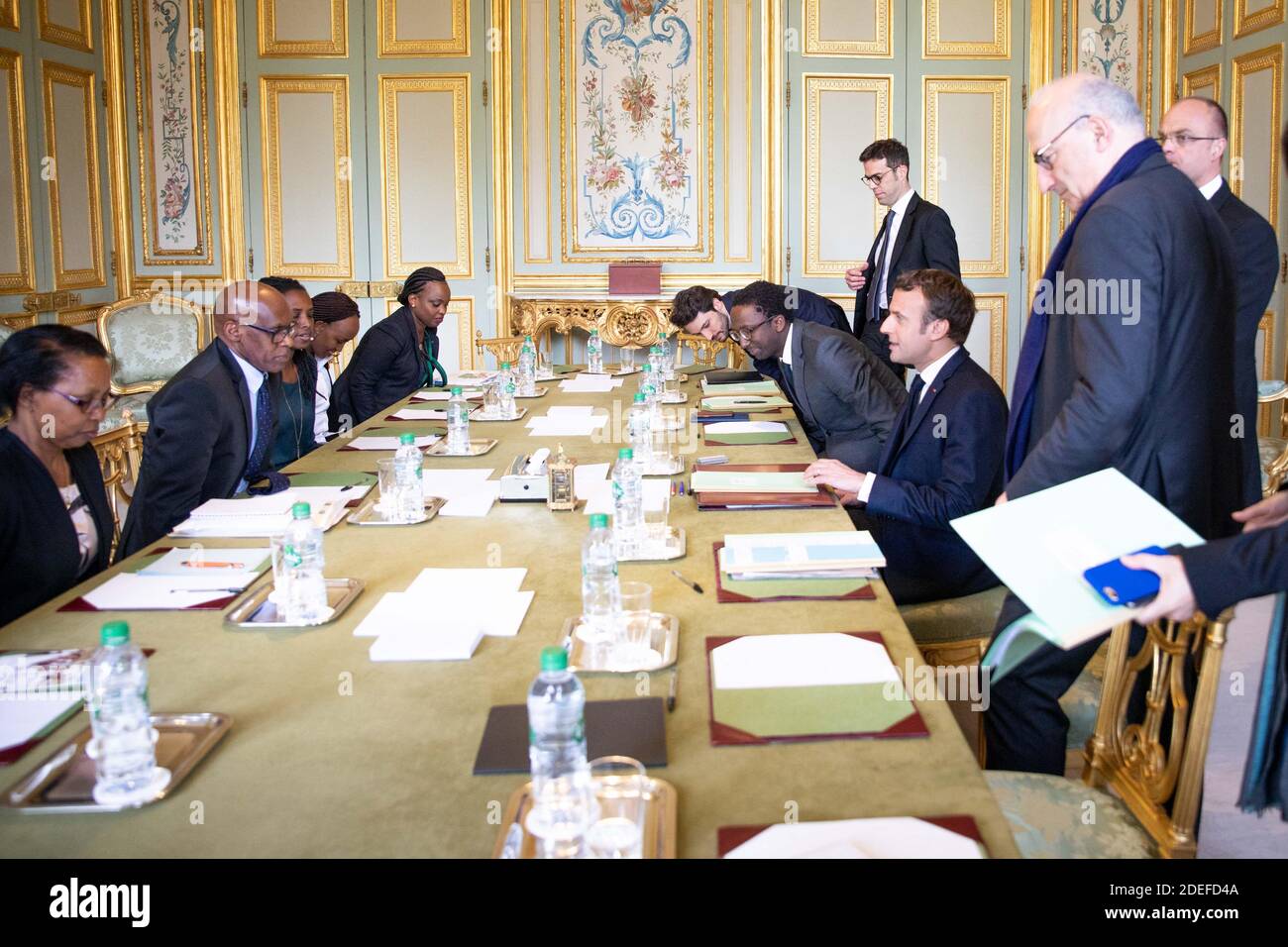 French President Emmanuel Macron (R) meets French representatives of ...