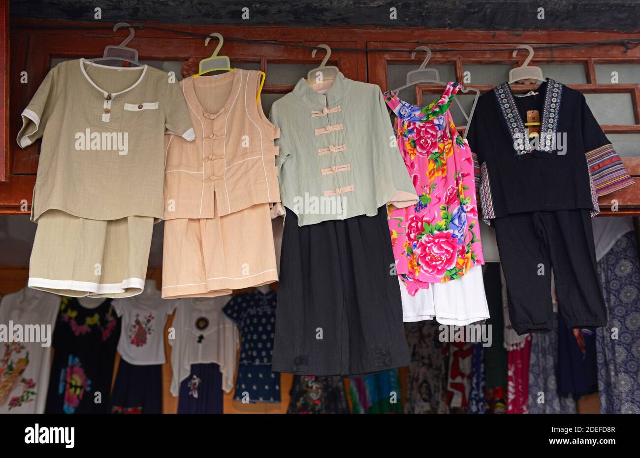 Traditional style clothes for sale at a shop in Qingyan ancient town in ...