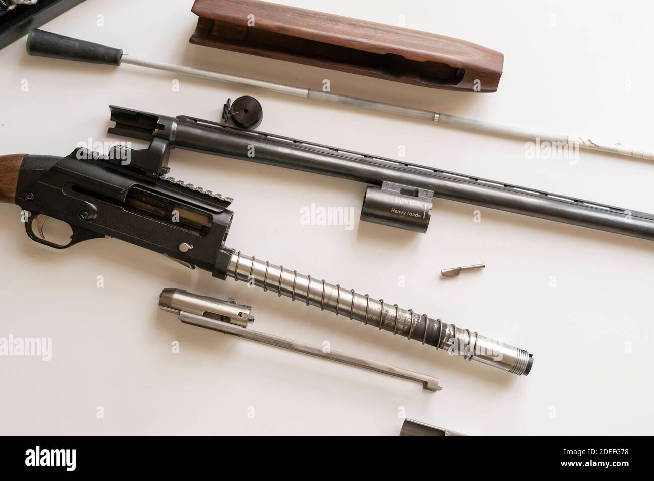 classic wooden and metal hunting weapon rifle disassembled parts and ...