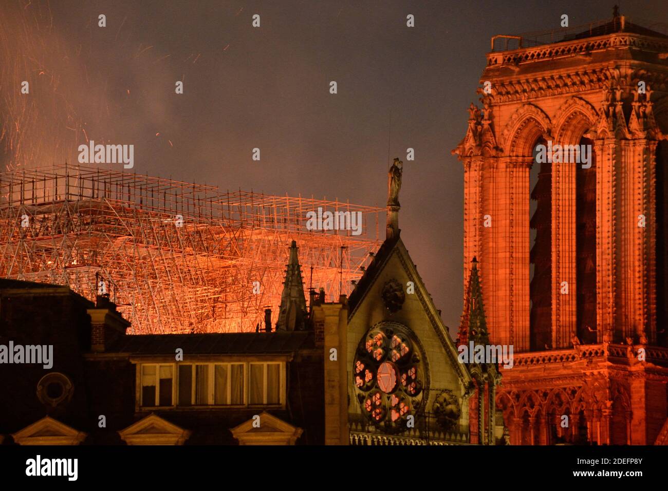 Smoke and flames rise during a fire at the landmark Notre-Dame ...