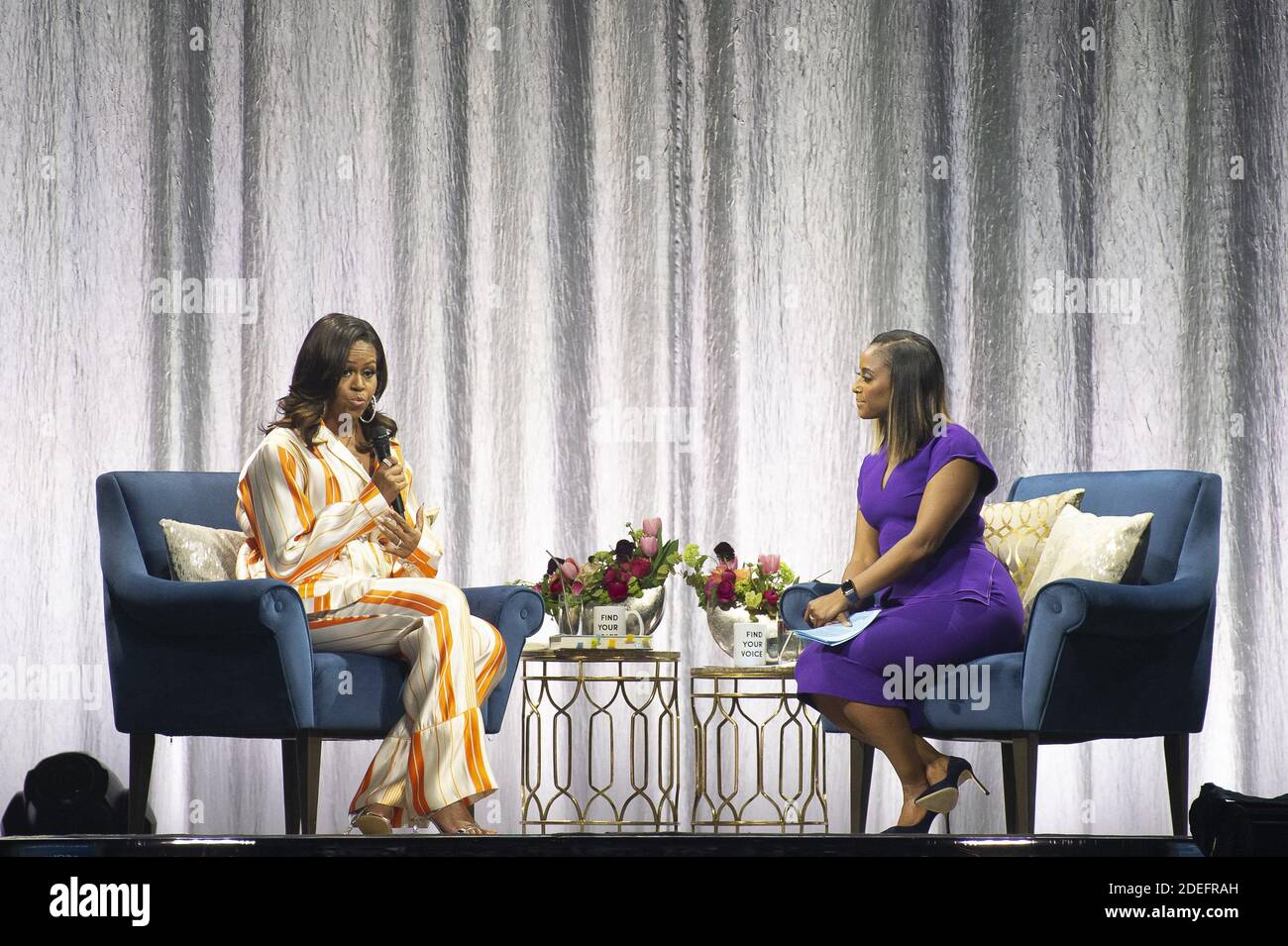 Former US first lady Michelle Obama speaks on stage at Accor Hotel ...