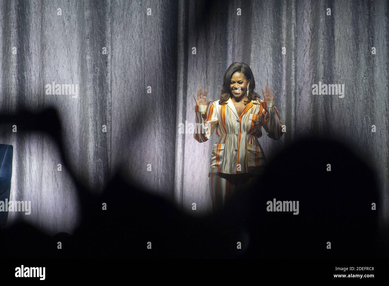 Former US first lady Michelle Obama speaks on stage at Accor Hotel ...