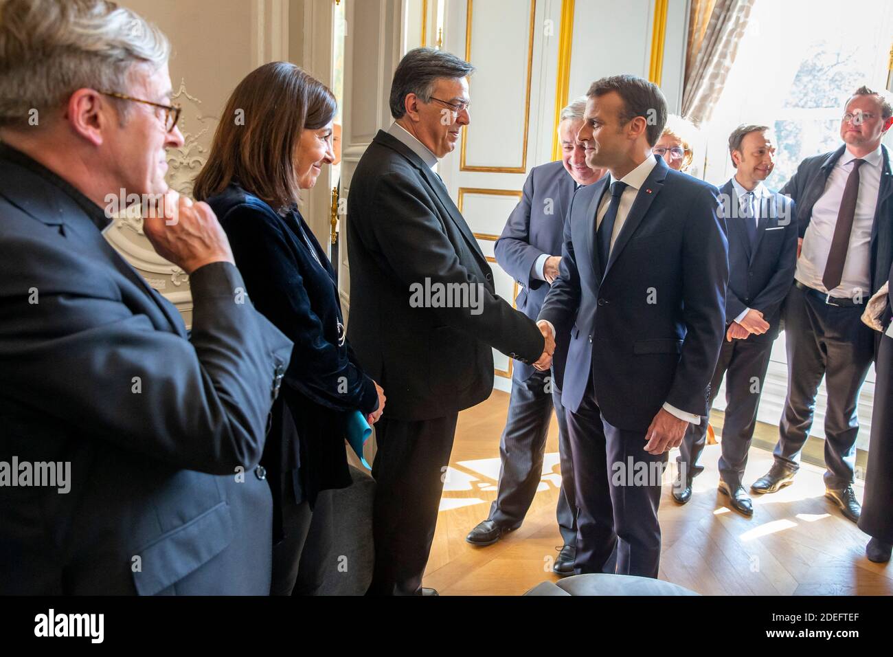French President Emmanuel Macron with Notre Dame de Paris' rector ...