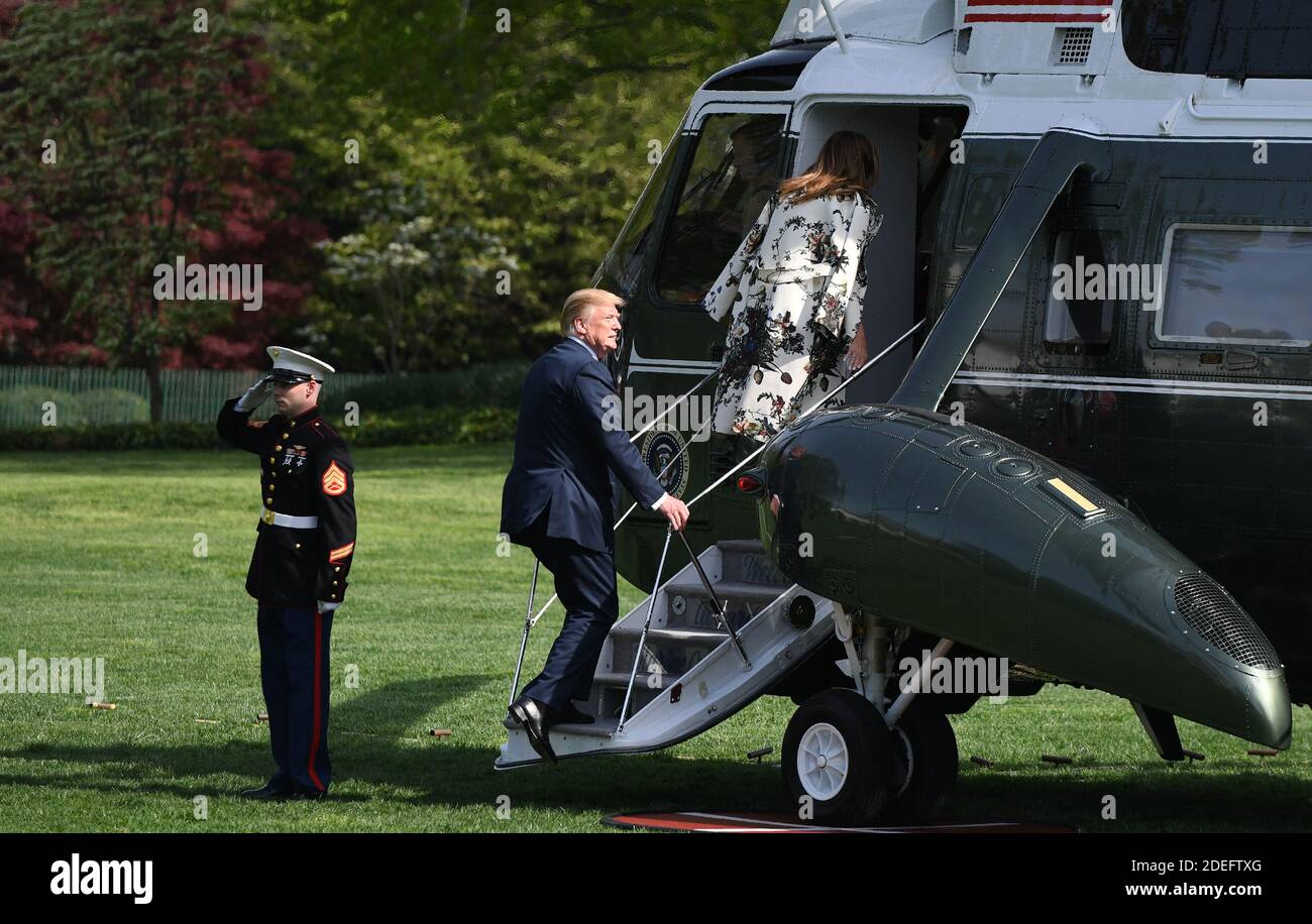 US President Donald Trump and first lady Melania Trump depart the White ...