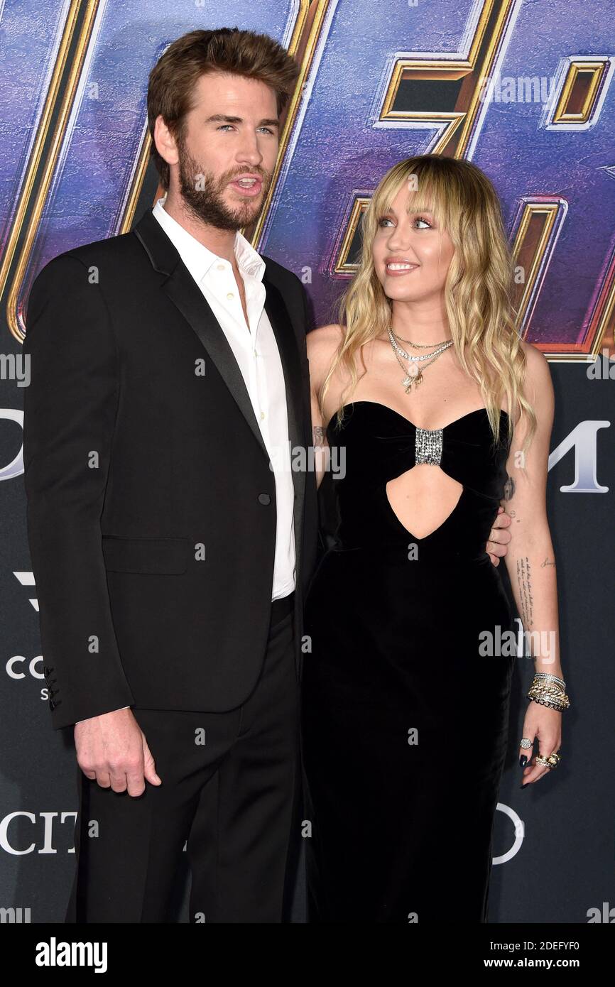 Liam Hemsworth and Miley Cyrus attend the world premiere of Walt Disney ...