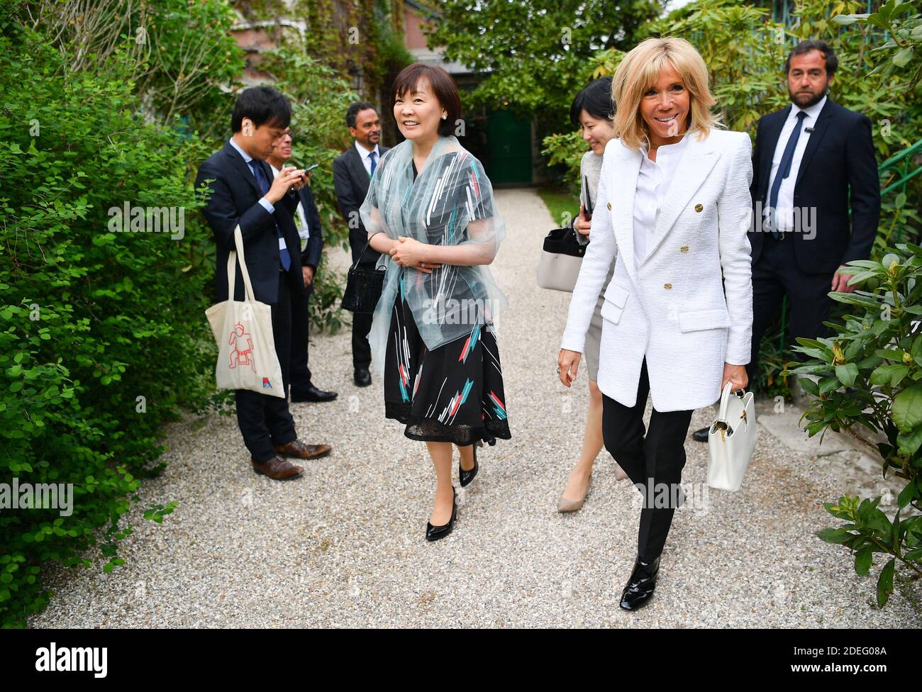 The first lady Brigitte Macron and wife of Prime Minister of Japan Akie ...
