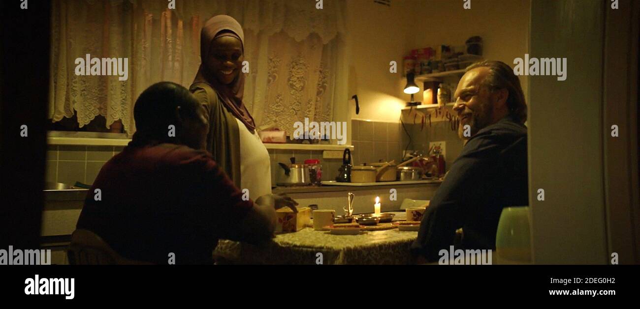 HEARTS AND BONES, from left: Andrew Luri, Bolude Watson, Hugo Weaving ...