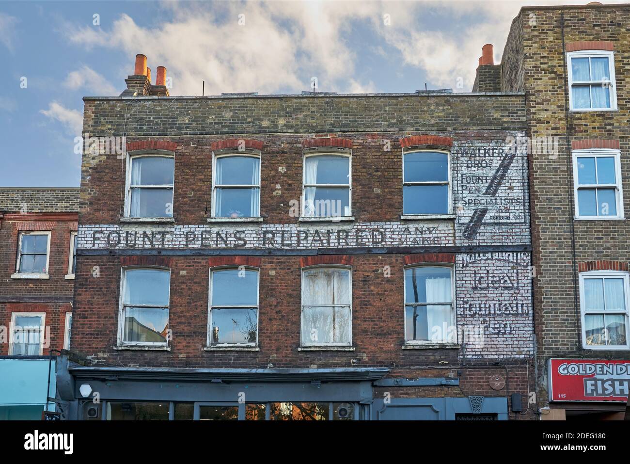 hand painted advert on building. Old advert on building. ghost advert ...