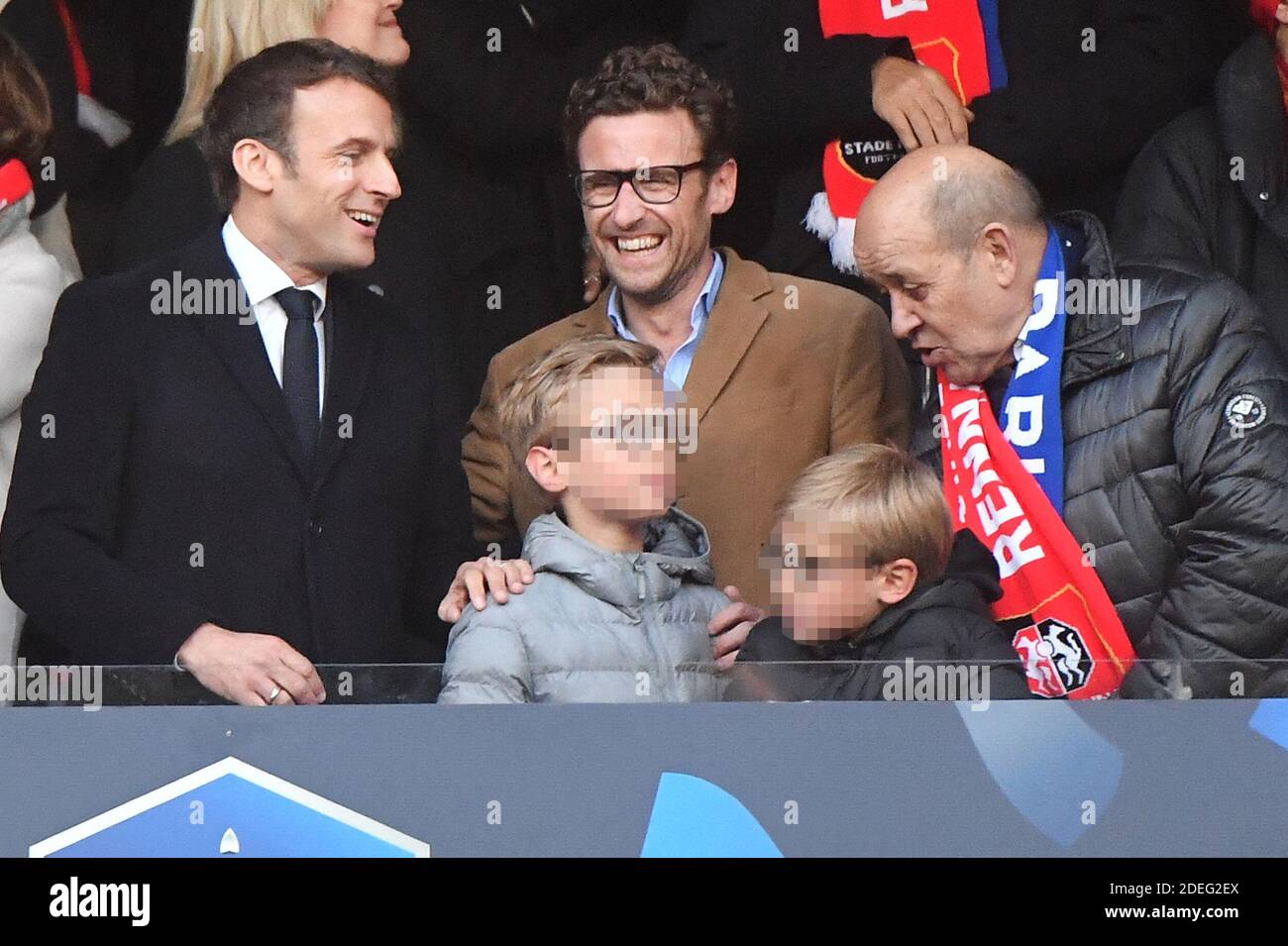 France's President Emmanuel Macron and his brother Laurent Macron and ...