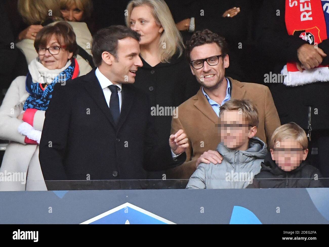 France's President Emmanuel Macron and his brother Laurent Macron and ...