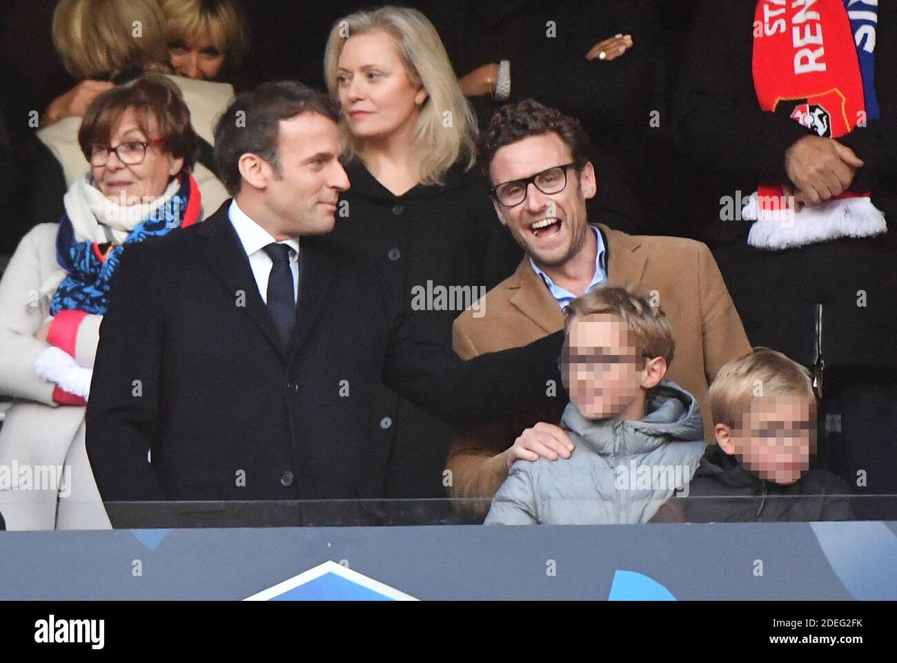 France's President Emmanuel Macron and his brother Laurent Macron and ...