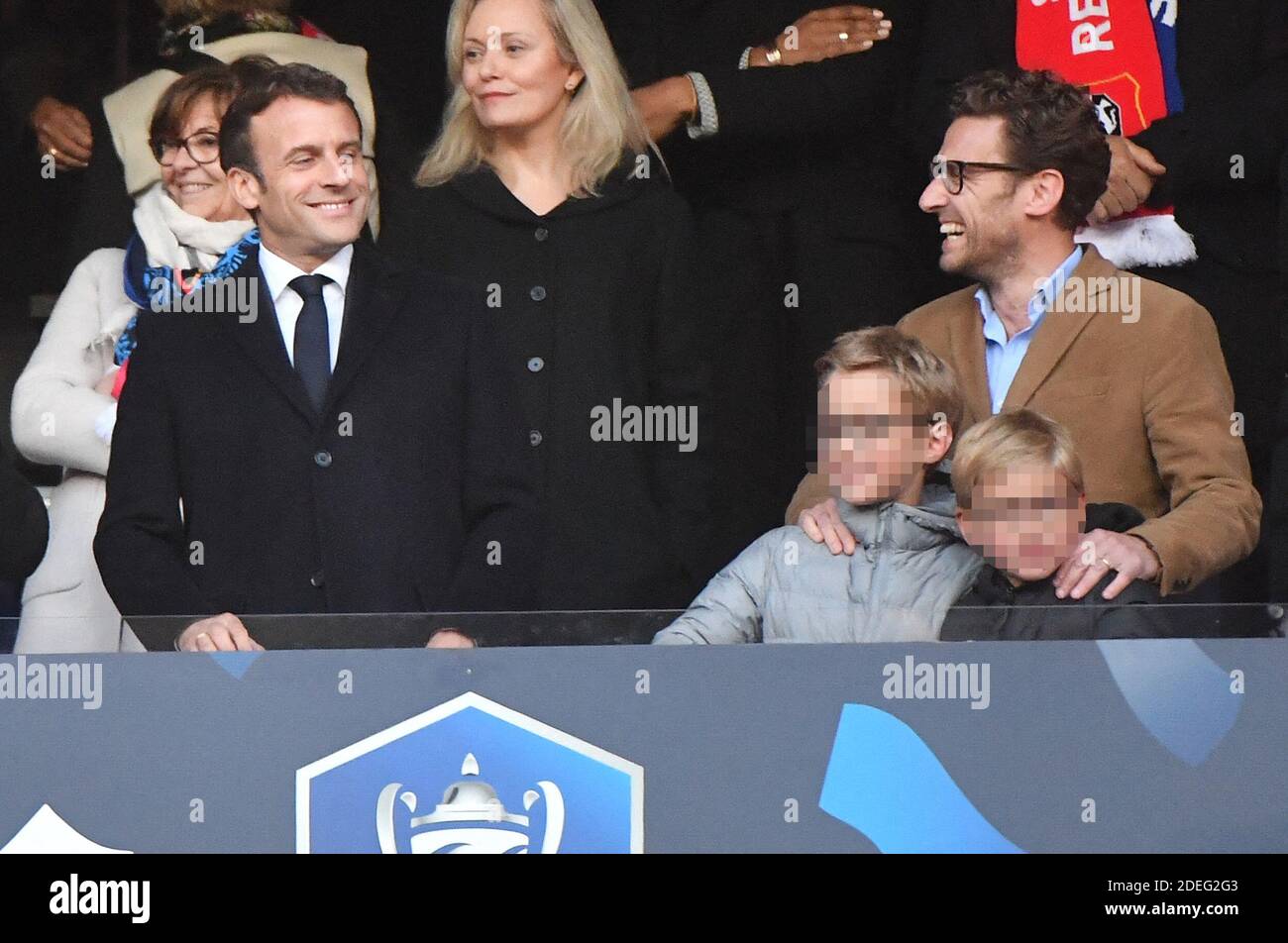 France's President Emmanuel Macron and his brother Laurent Macron and ...