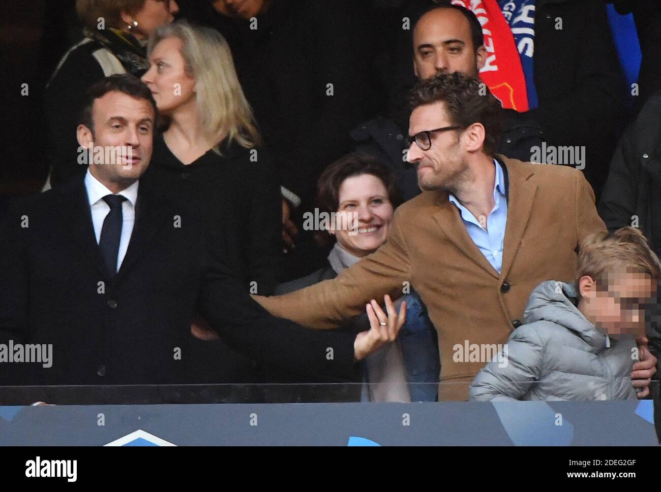 France's President Emmanuel Macron and his brother Laurent Macron and ...