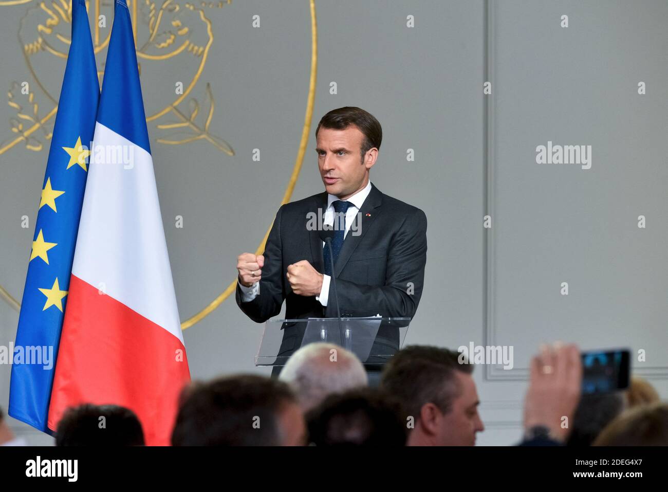 French President Emmanuel Macron and first lady Brigitte Macron receive ...
