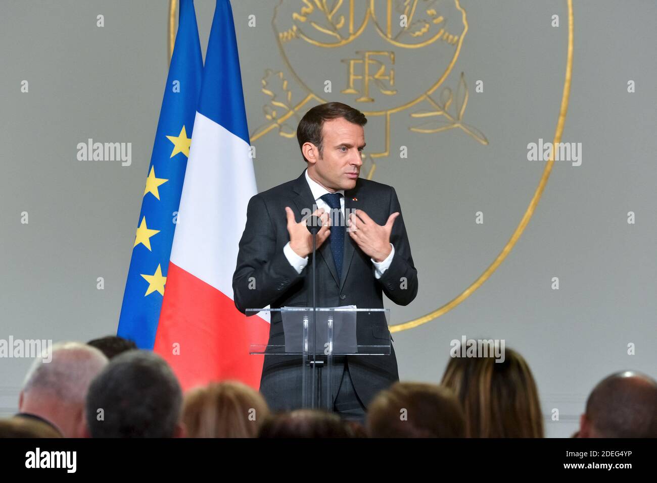 French President Emmanuel Macron and first lady Brigitte Macron receive ...