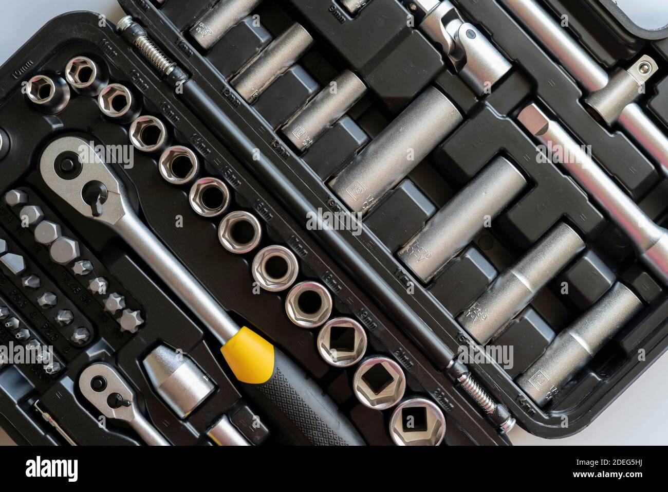 a top view of the black case with collection kit of manual steel tools ...