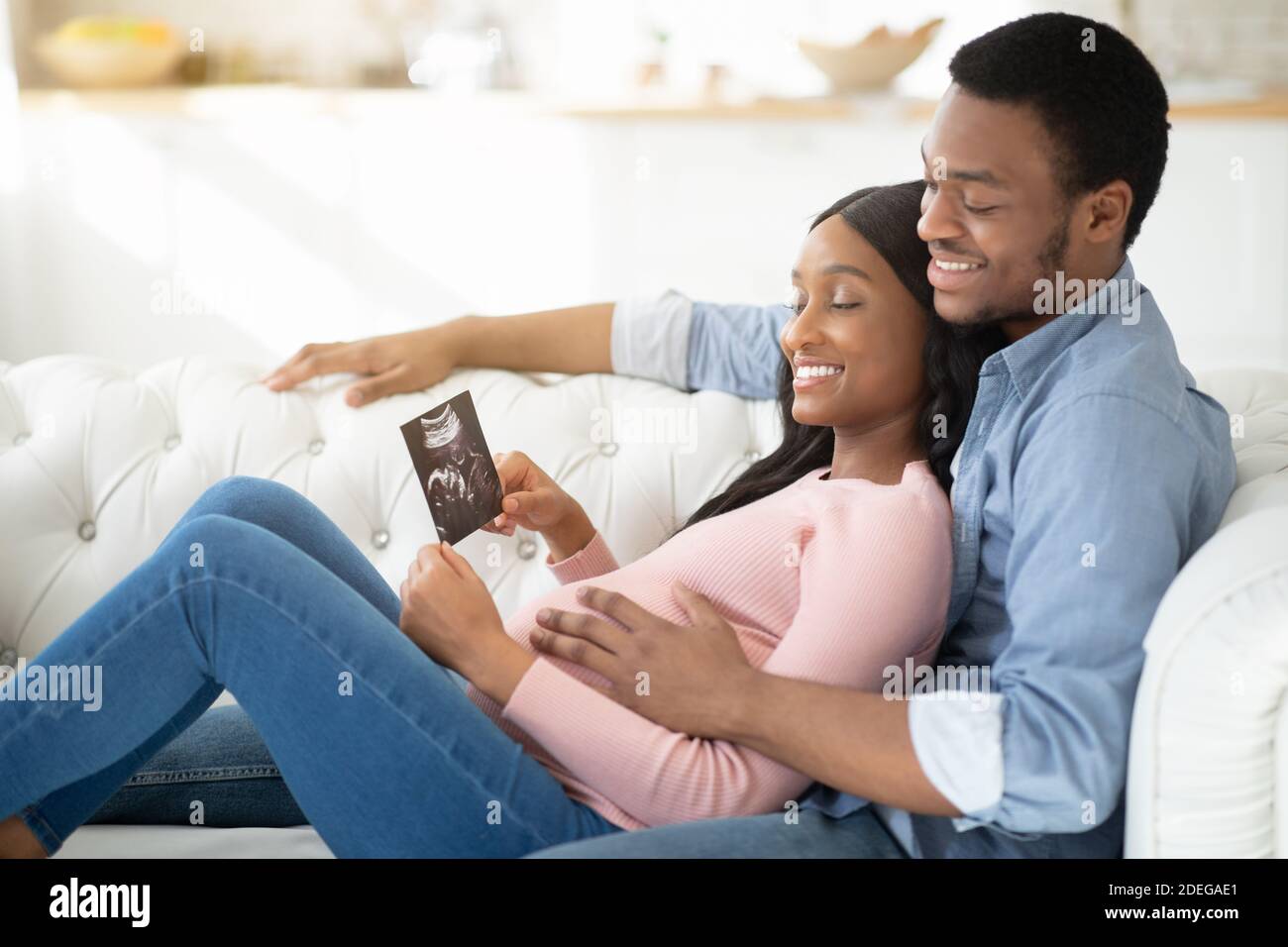 Couple Cuddling Sitting