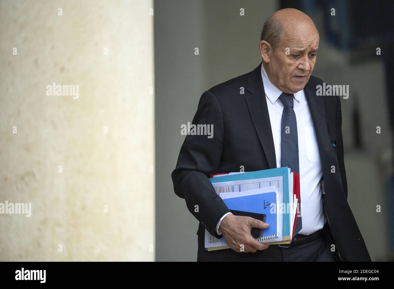 French Foreign Affairs Minister Jean-Yves Le Drian leaves the Elysee ...