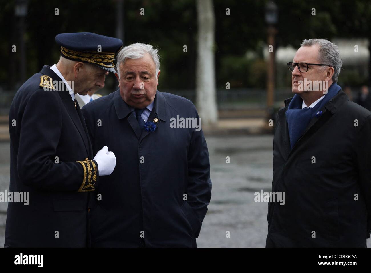 Richard Ferrand and Gerard Larcher attend a ceremony in front of the ...