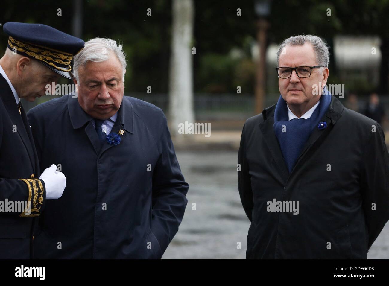Richard Ferrand and Gerard Larcher attend a ceremony in front of the ...