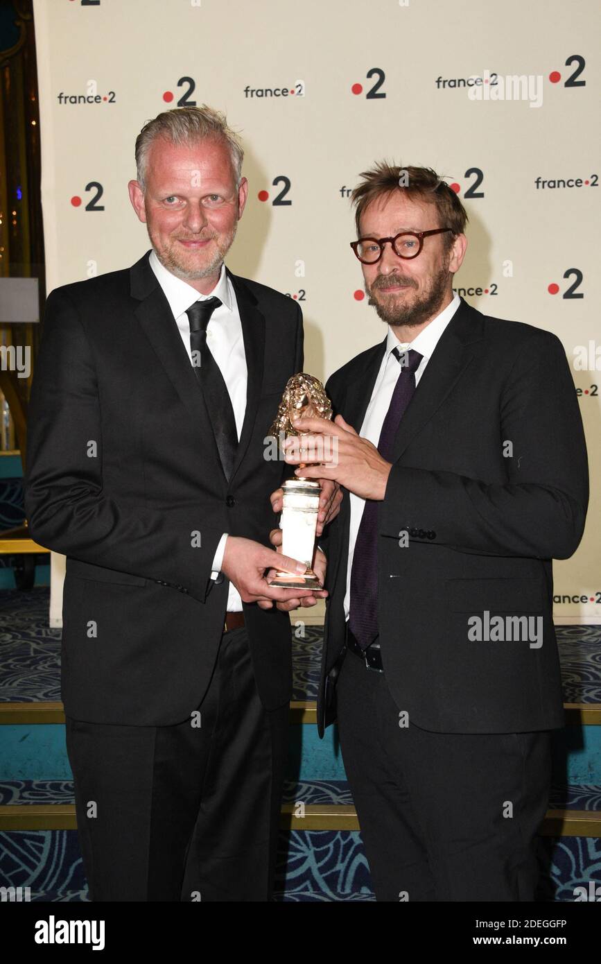 Thomas Ostermeier and Eric Ruf posing with their award for 'La nuit des ...