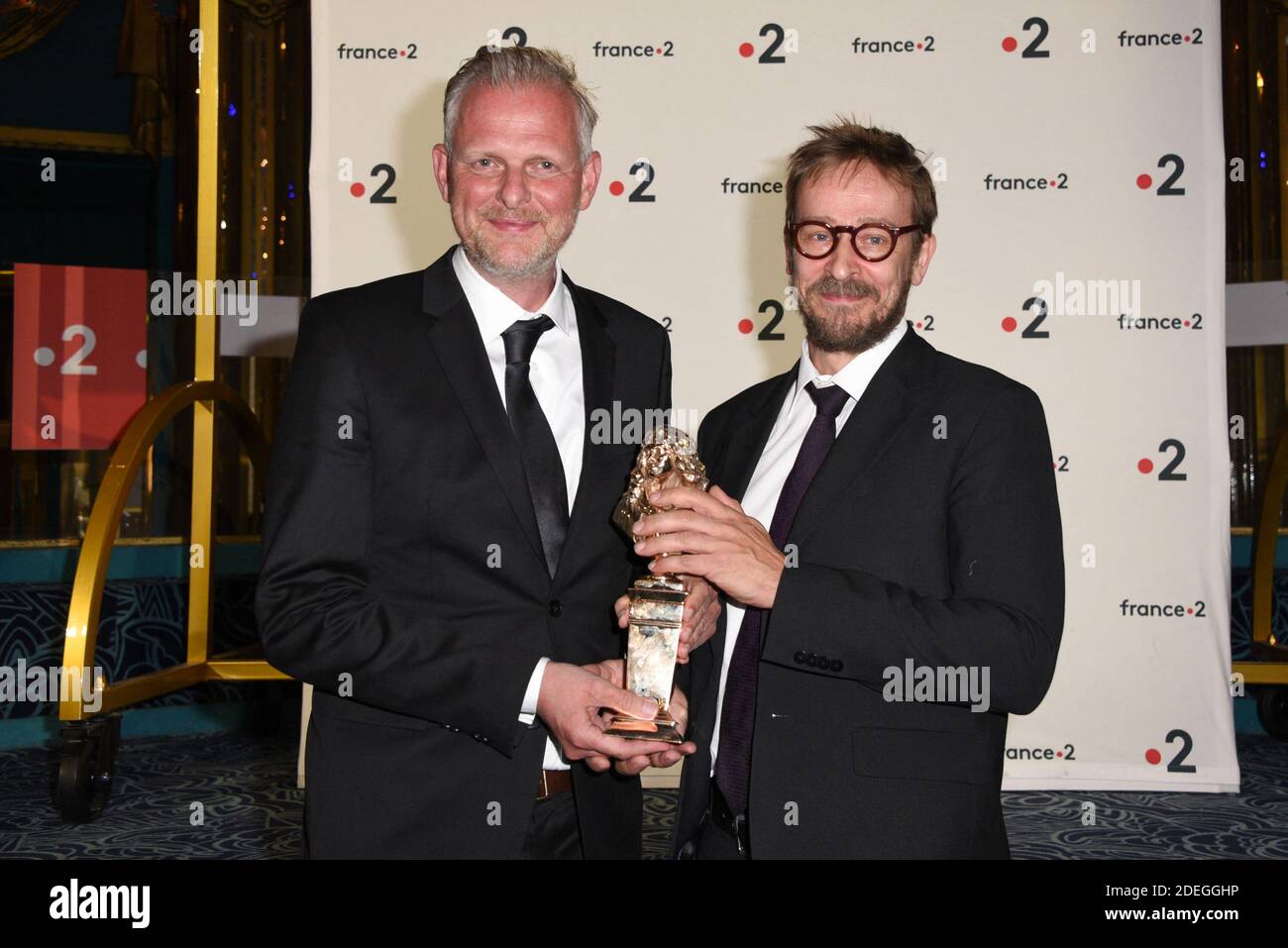 Thomas Ostermeier and Eric Ruf posing with their award for 'La nuit des ...