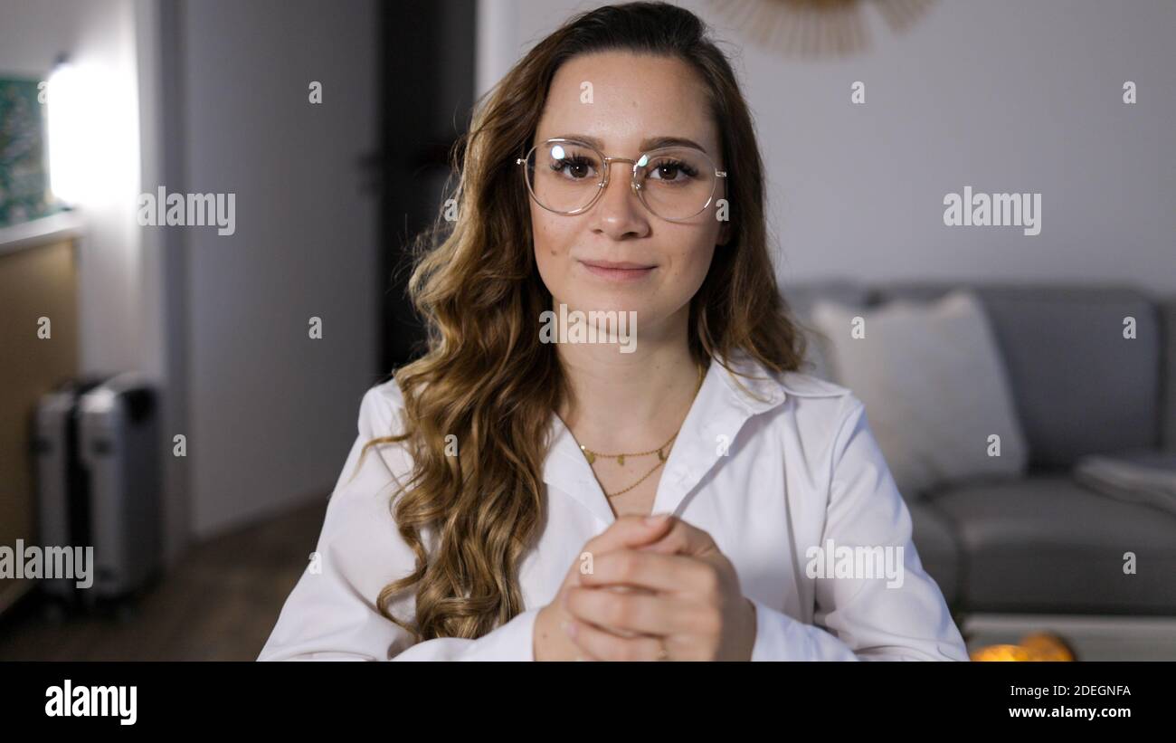 Young woman attends a conference call Stock Photo - Alamy