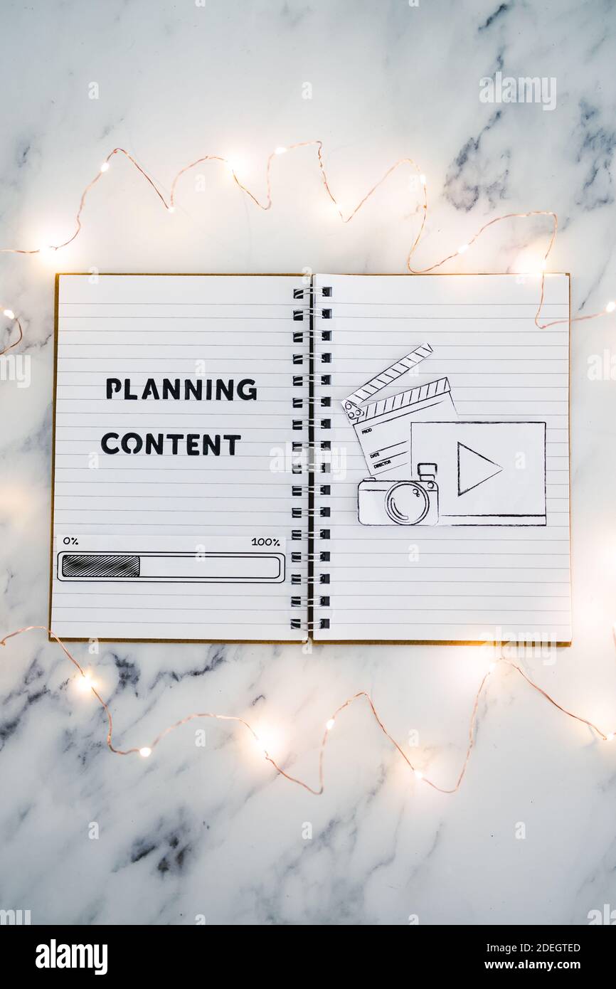 planning content for social media conceptual image, notebook with photo ...