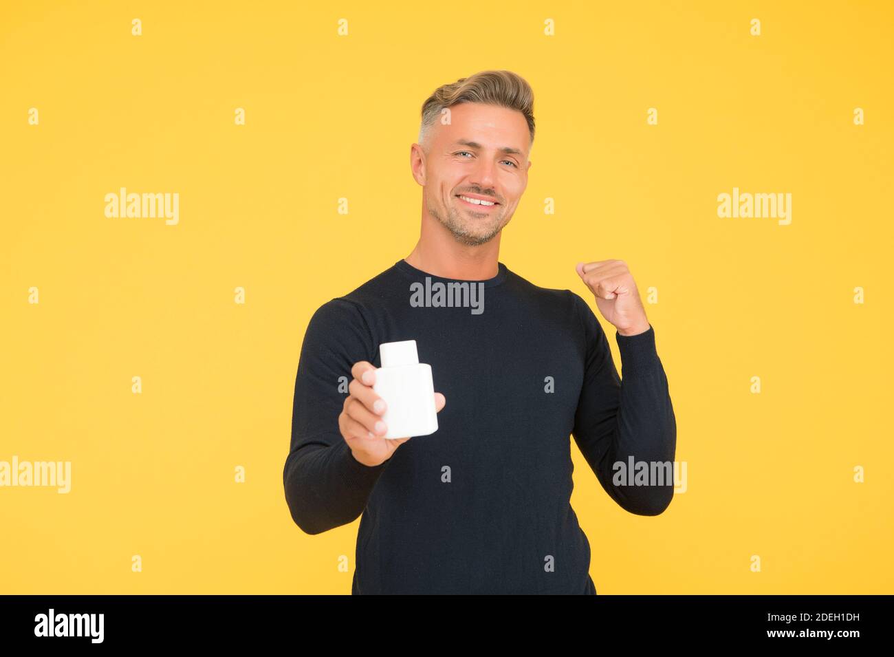 Cologne that will boost your confidence. Happy man present deodorant ...