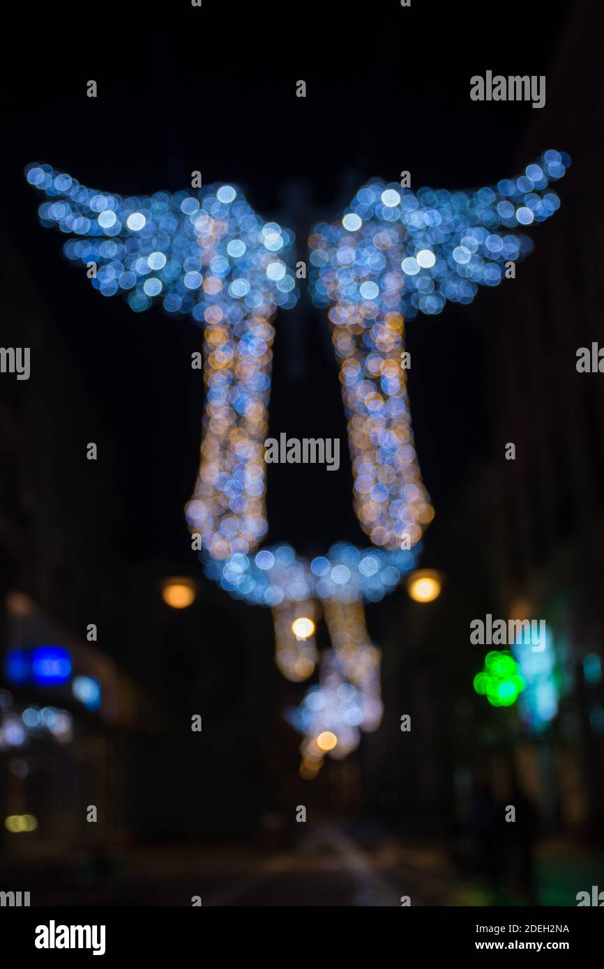 Abstract blurred background with illuminated angel wings , colorful ...