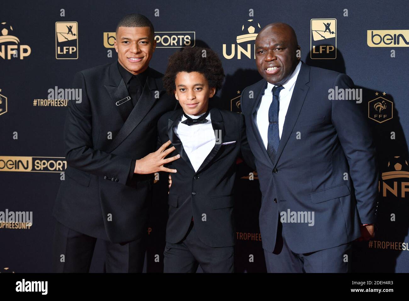 Kylian Mbappe and his brother Ethan and his father attending the ...