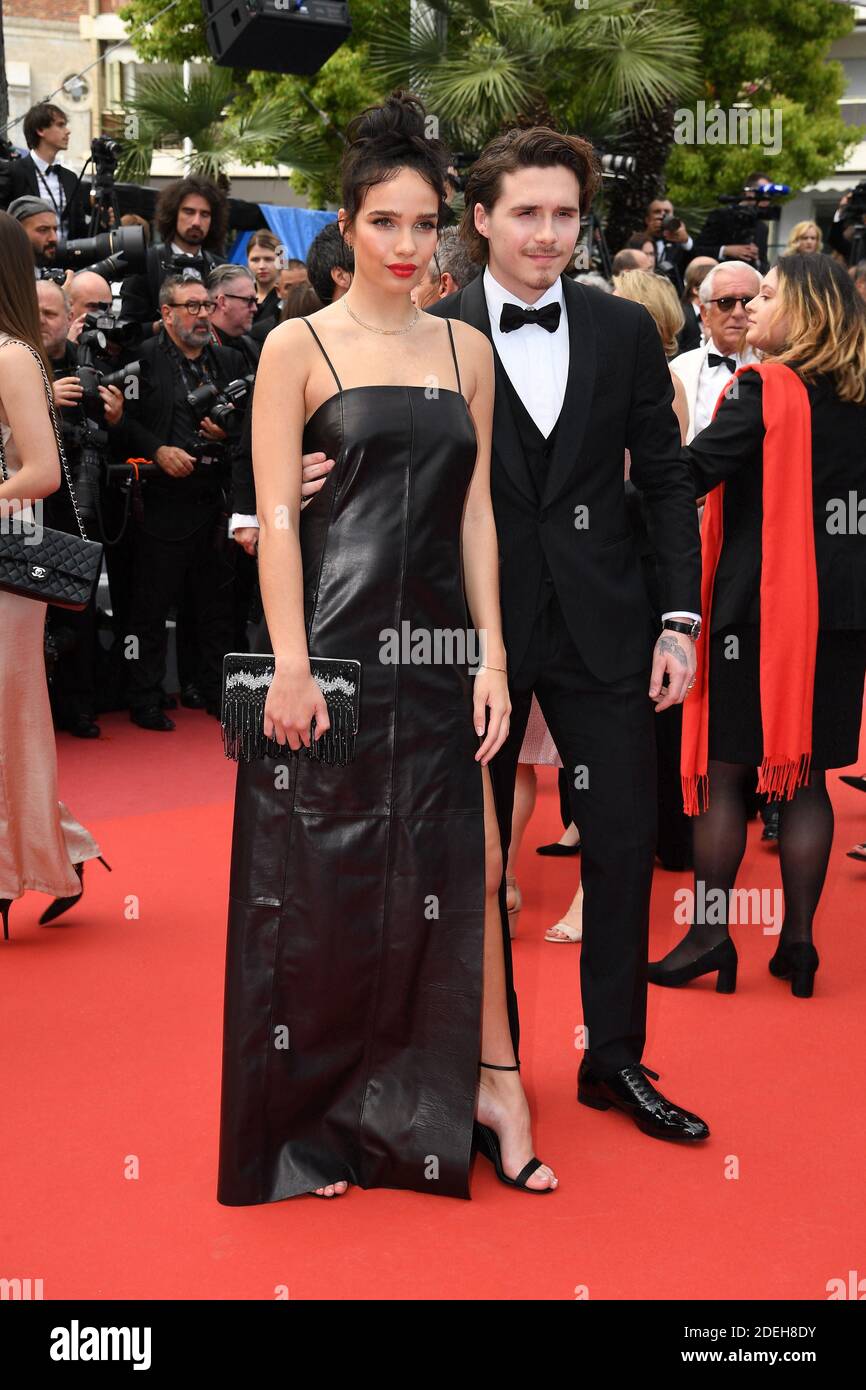 Brooklyn Beckham and Hanna Cross posing on the red carpet for the ...