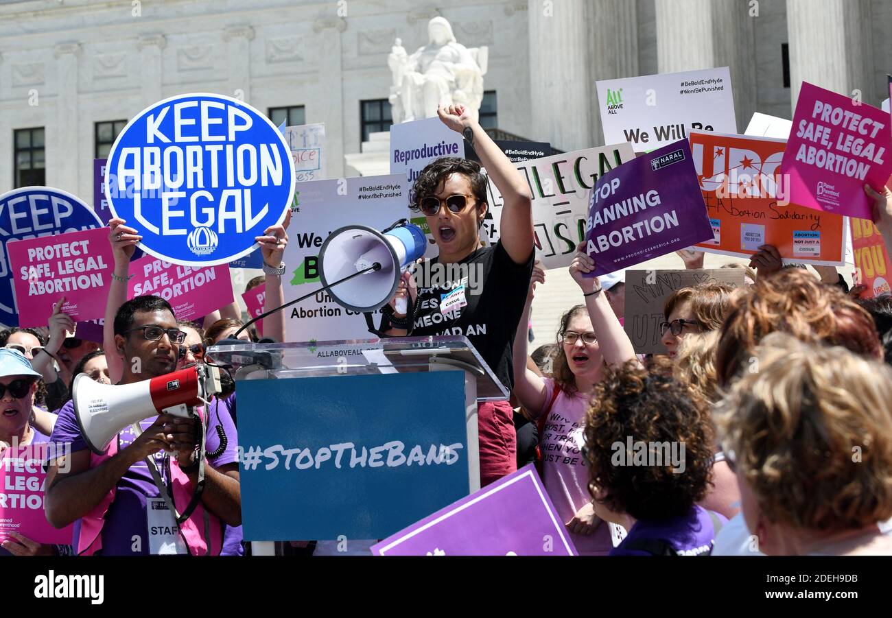 Pro-abortion activists hold placards during a rally at the Supreme ...