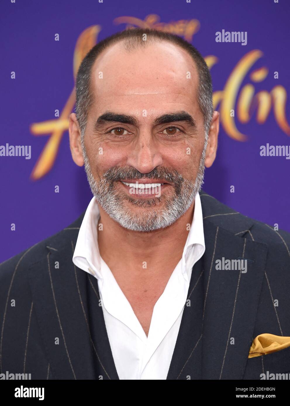 Navid Negahban arriving to the 'Aladdin' World Premiere at El Capitan ...