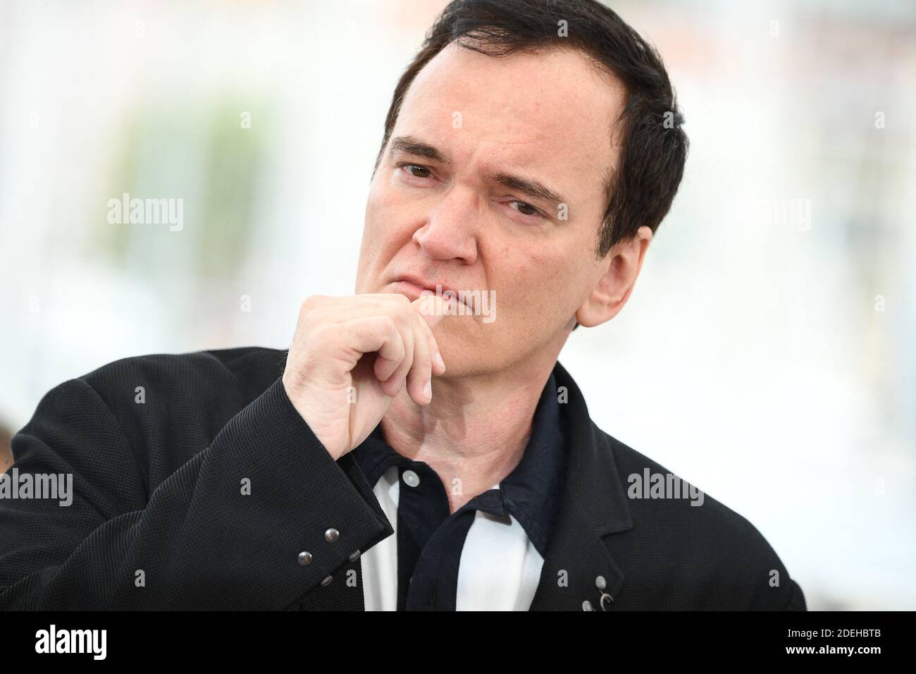 Quentin Tarantino posing during the photocall of Once Upon A Time In ...