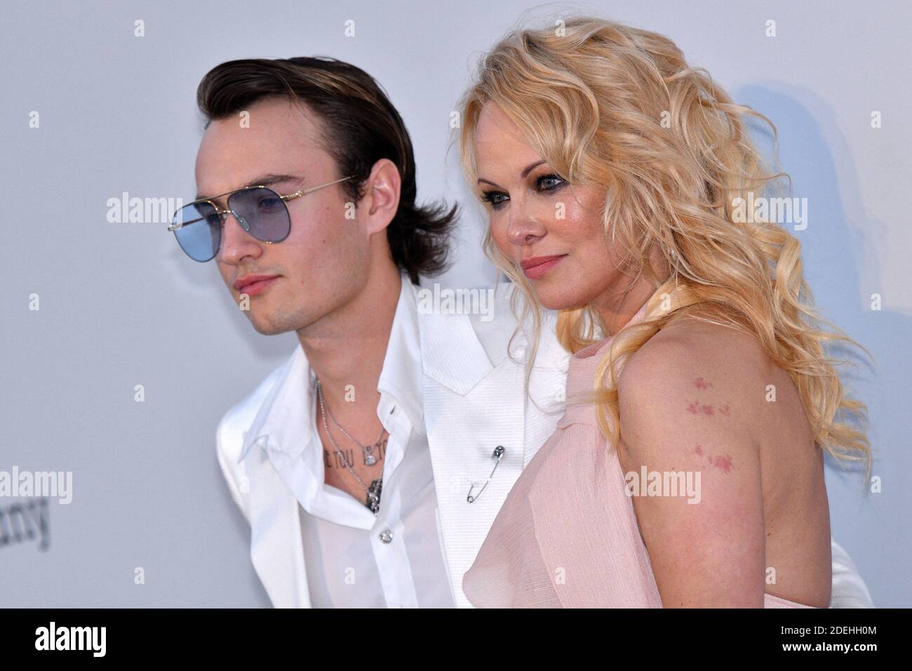 Brandon Lee and Pamela Anderson attend the amfAR Cannes Gala 2019 at ...