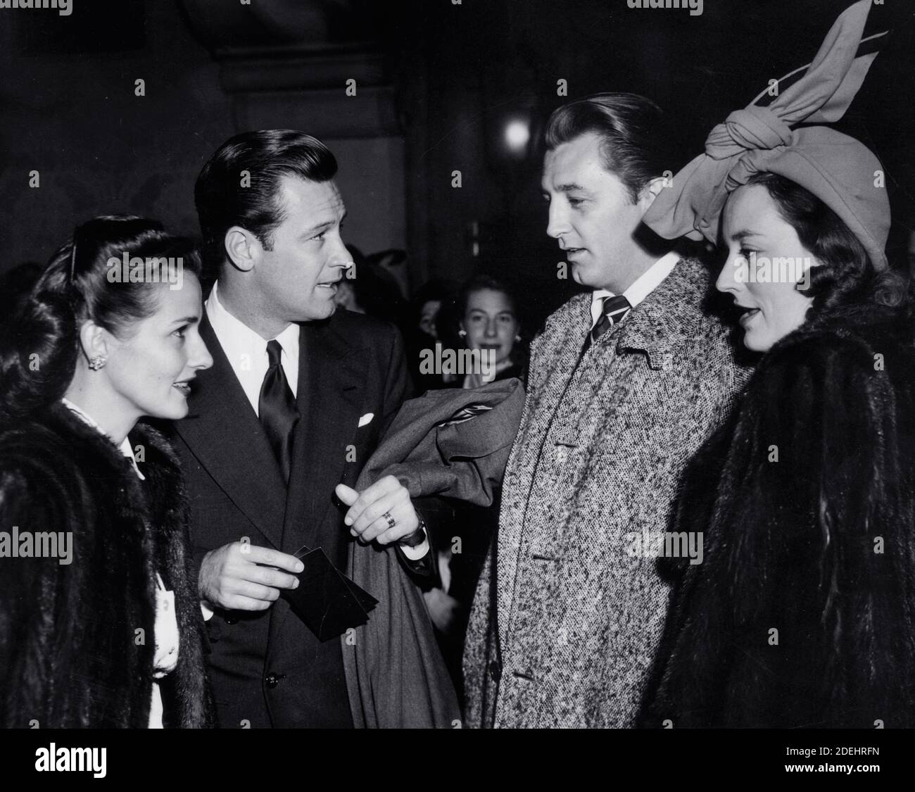 Brenda Marshall with husband William Holden and Robert Mitchum with ...