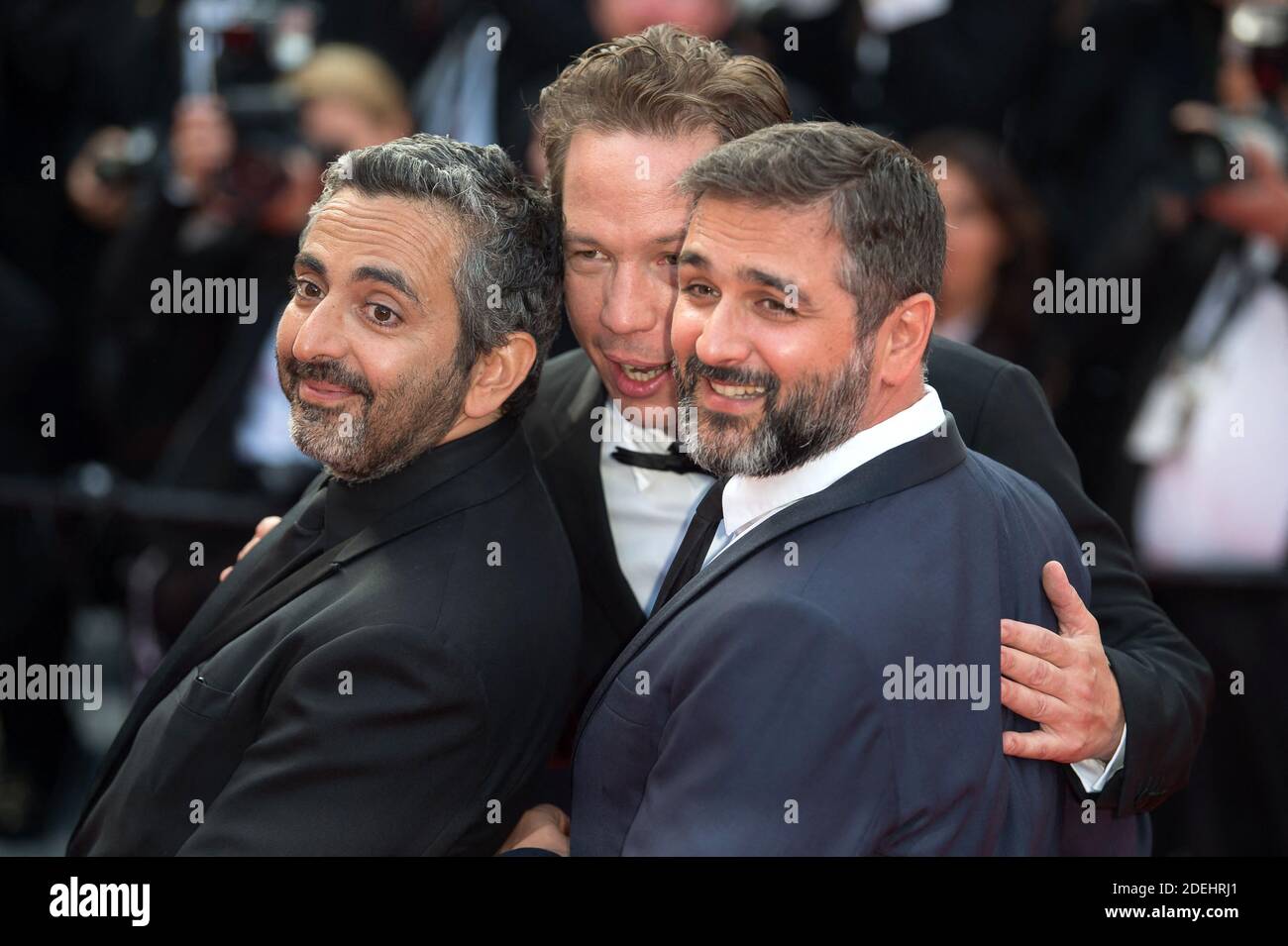 Eric Toledano, Reda Kateb and Olivier Nakache arriving on the red ...