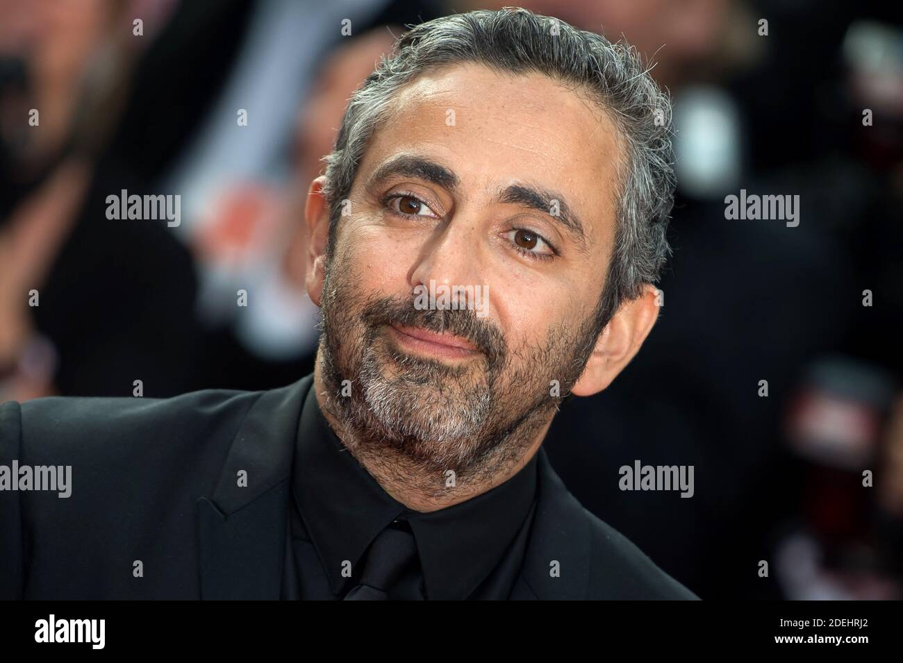 Eric Toledano arriving on the red carpet for the Closing Ceremony and ...