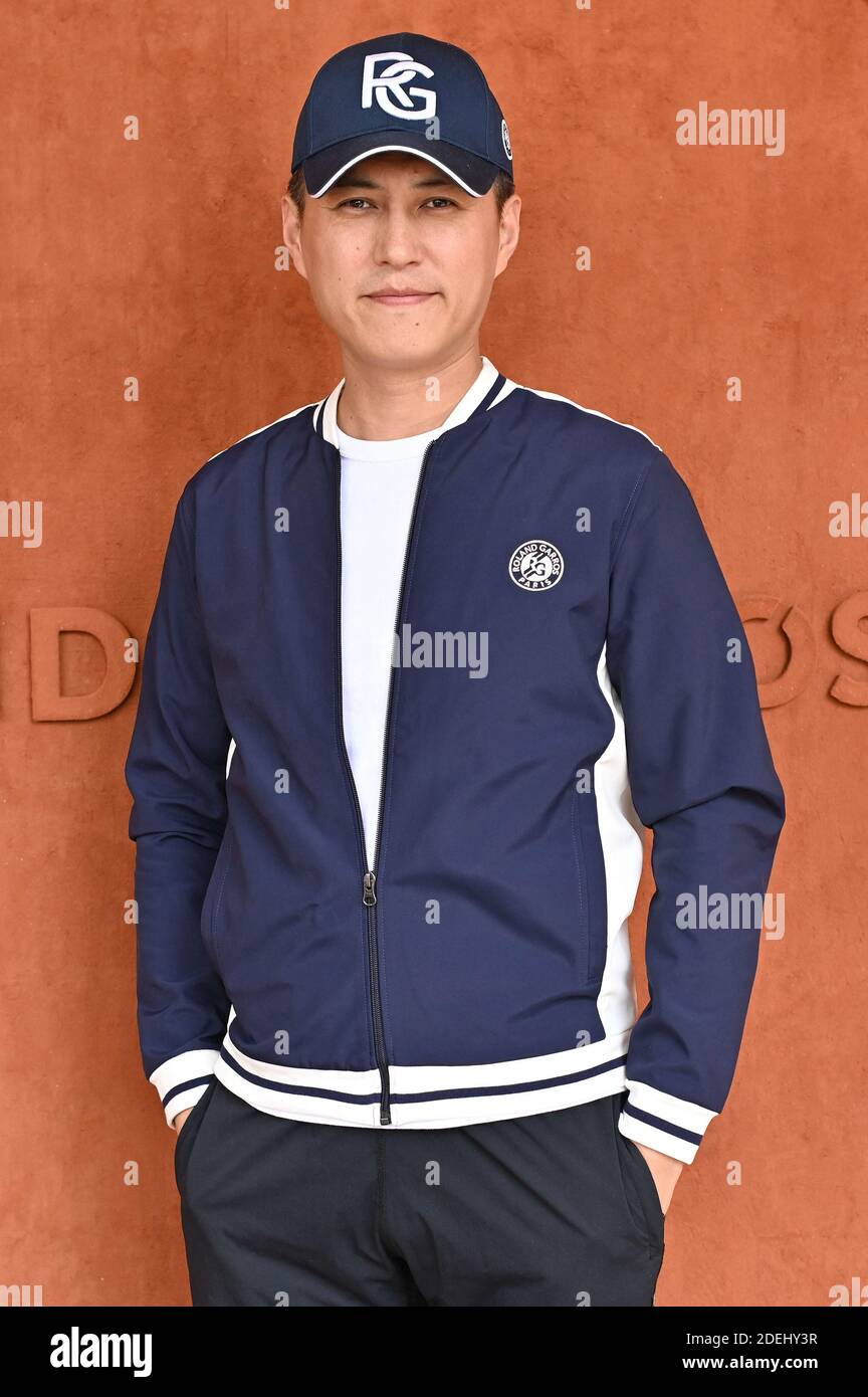 Chenese actor Jin Dong attends the 2019 French Tennis Open - Day Two at ...