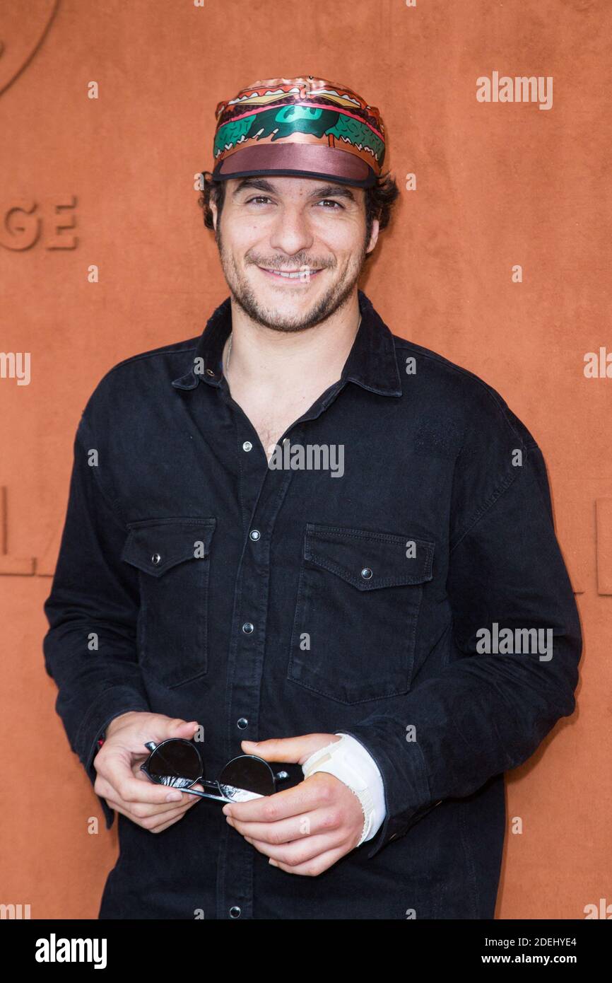 Amir Haddad in Village during French Tennis Open at Roland-Garros arena ...