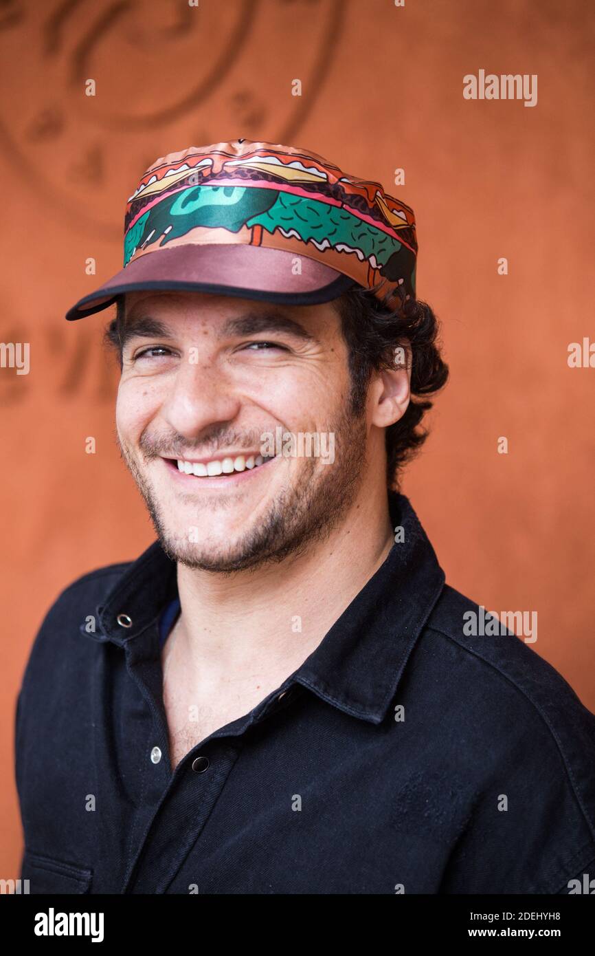 Amir Haddad in Village during French Tennis Open at Roland-Garros arena ...