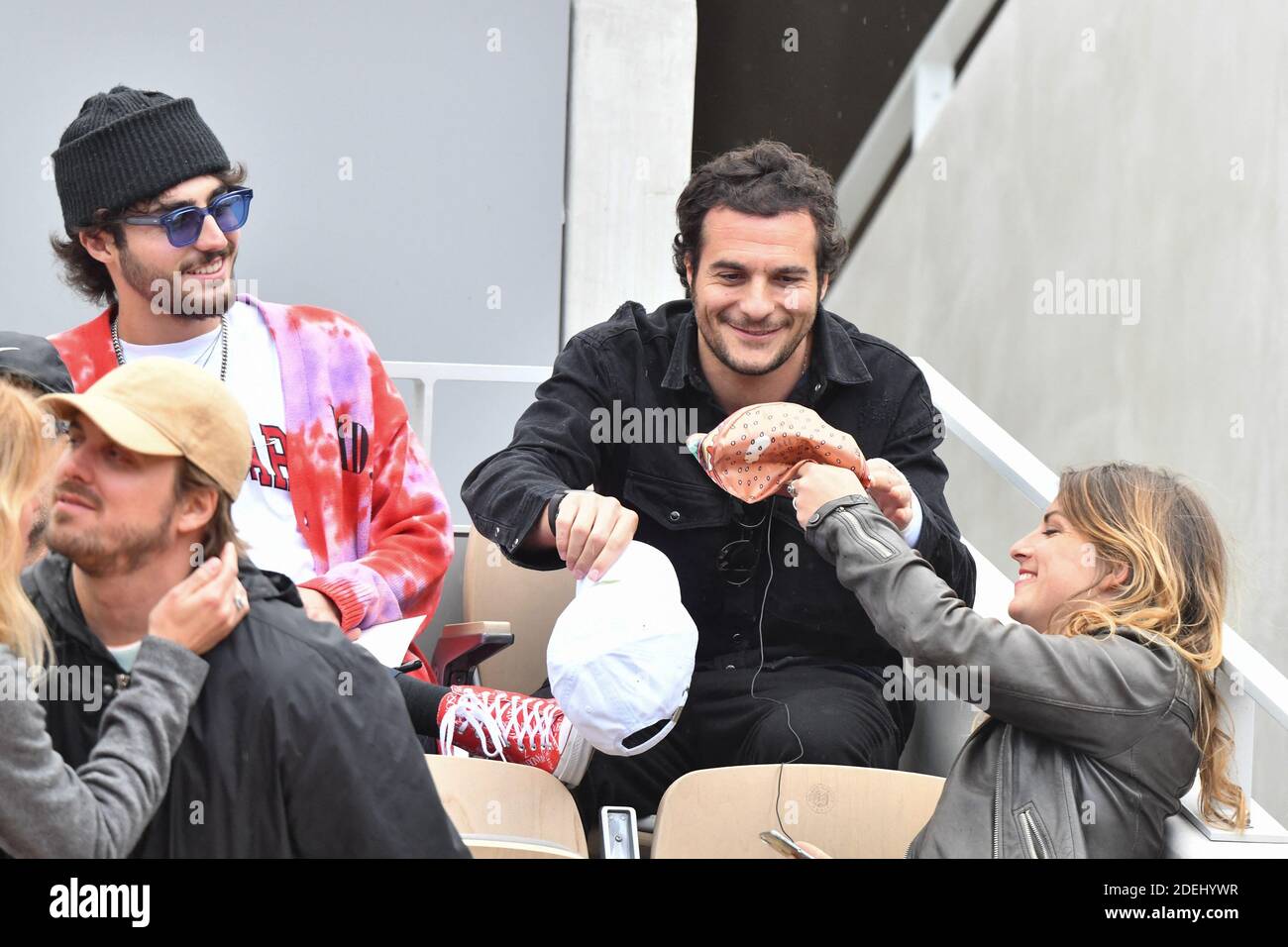 Amir Haddad and a friend attend the 2019 French Tennis Open - Day Three ...