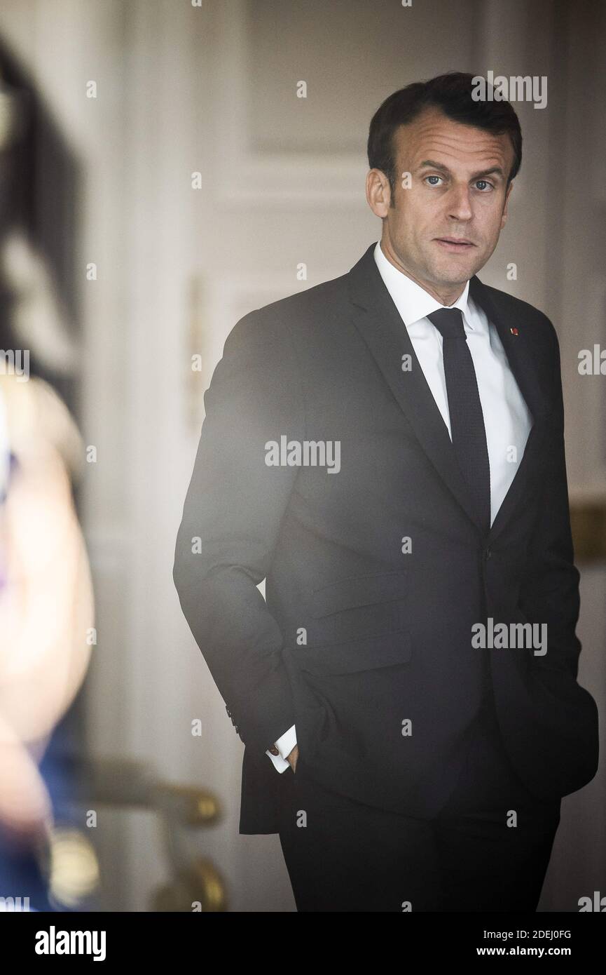 French President Emmanuel Macron gestures at the Elysee presidential ...