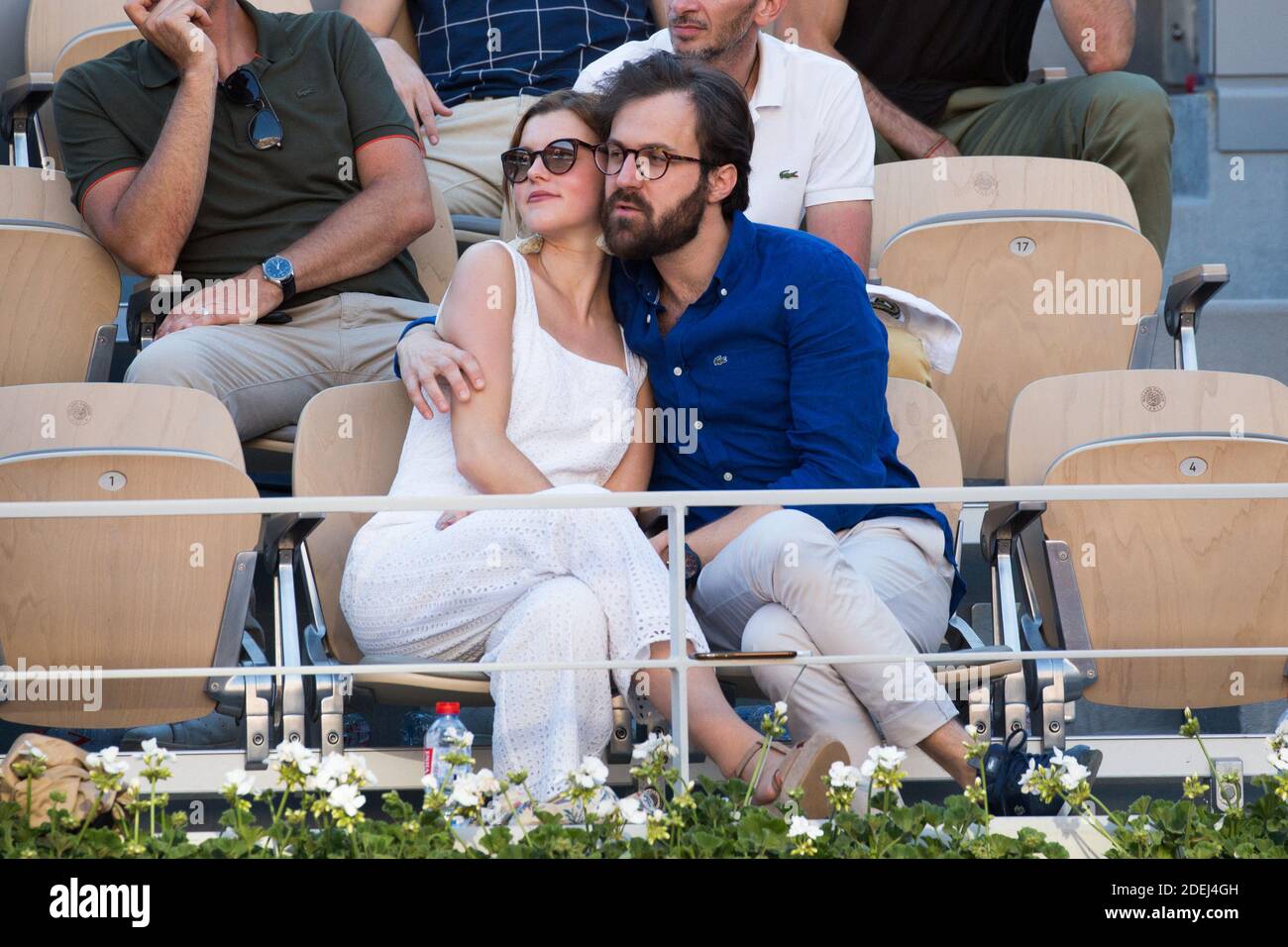 Charlotte Peretti and Antoine Gouy in stands during French Tennis Open ...