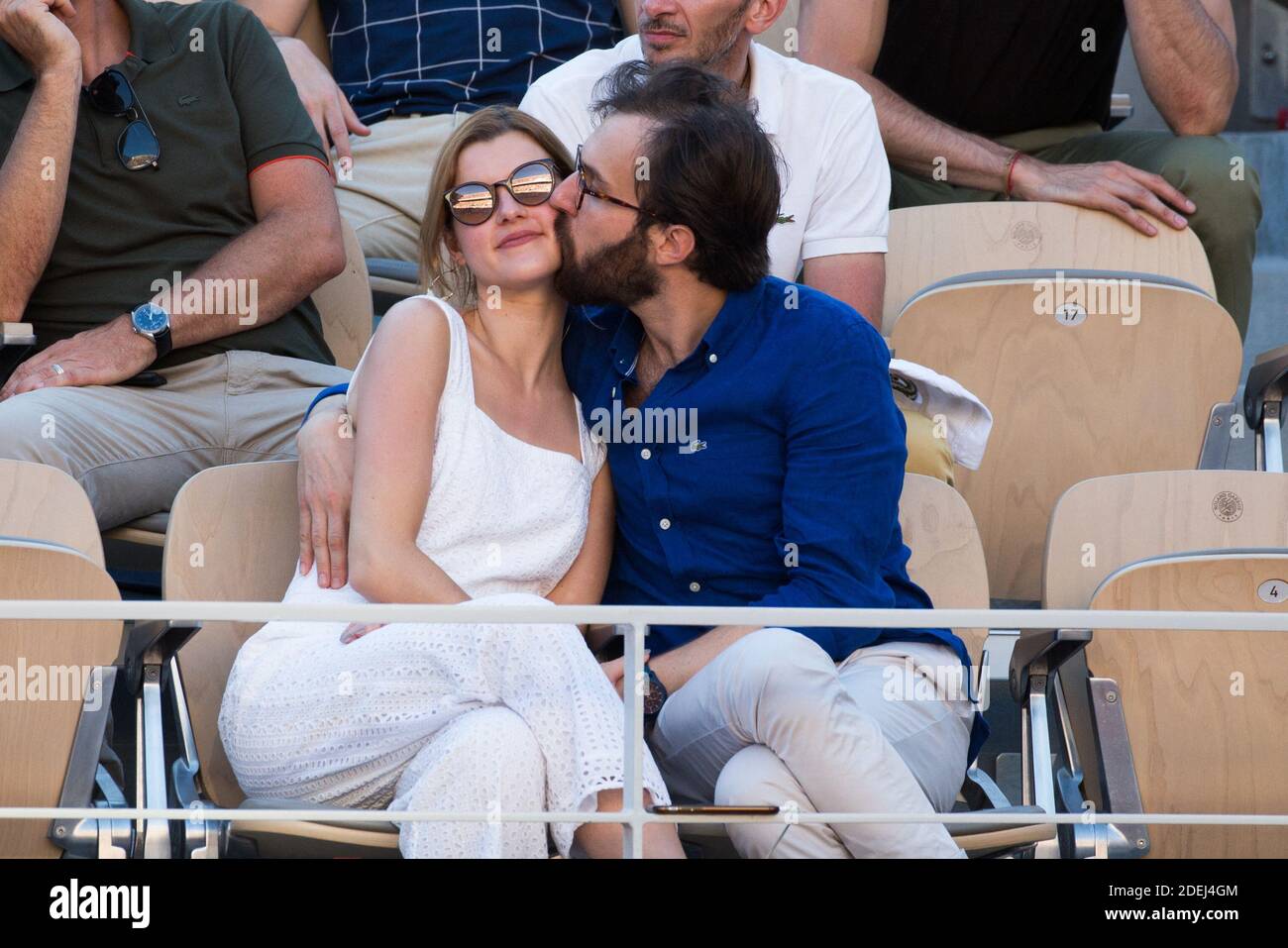 Charlotte Peretti and Antoine Gouy in stands during French Tennis Open ...